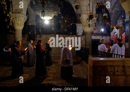 A Franciscan friar praying in Chapel of Mary Magdalene inside the Stock ...