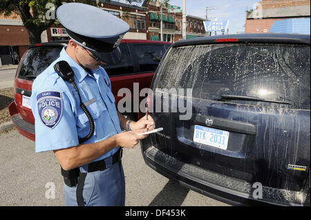 Traffic Police writing a parking ticket in Tribeca, New York Stock ...