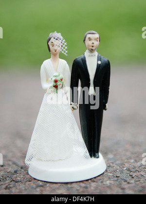 Man and Woman Wedding Cake Topper Isolated on White Background Stock ...