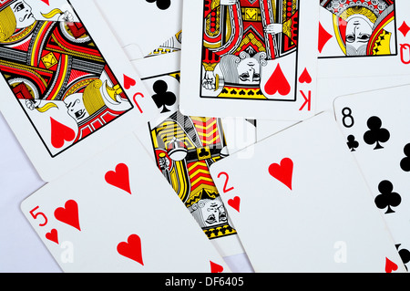 Playing cards scattered face up on a surface Stock Photo - Alamy