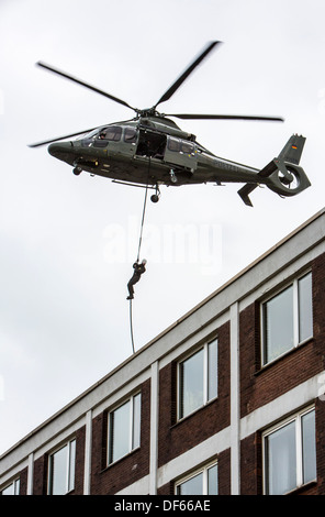 Police SWAT Team, fast roping from a police helicopter Stock Photo - Alamy