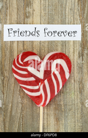 Paper with text forever on wooden table Stock Photo - Alamy