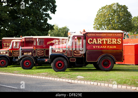travelling fun fair lorries trucks arrive Stock Photo - Alamy