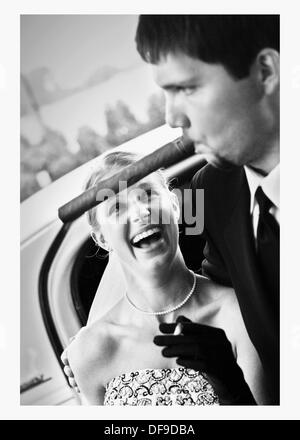 Bride smoking a cigar Stock Photo - Alamy