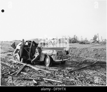 This photograph shows debris and significant damage to the Nelson ...