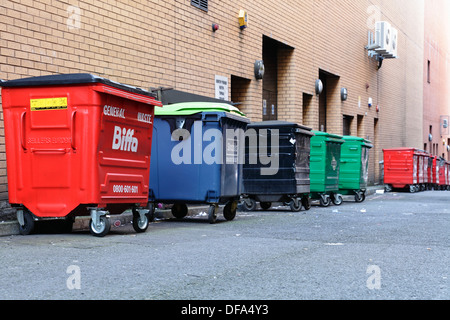 Commercial rubbish wheelie bins on back alley in Leeds West Yorkshire England UK Stock Photo - Alamy