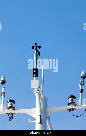 revolving cup-type anemometer measures the wind speed on board ...