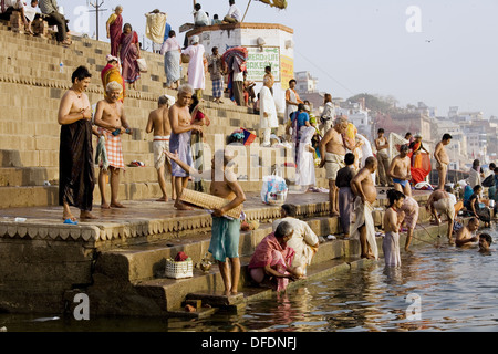 Worshipers bathing in the river Ganges at the holy city of Haridwar ...