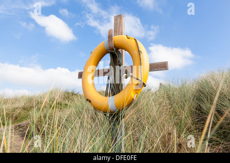 life buoy on stand on beach Stock Photo - Alamy