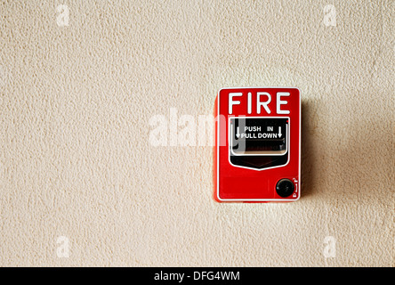Fire alarm button on the wall Stock Photo - Alamy