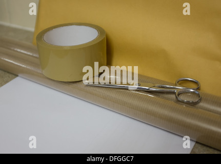 Packing Materials background with tape and envelope Stock Photo - Alamy