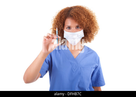 African American woman nurse wearing headphones working at office desk ...