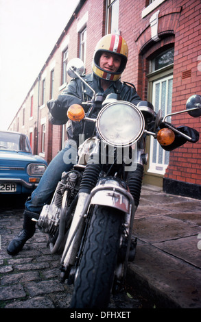 Lancashire street artist Walter Kershaw on his Honda motorbike in ...