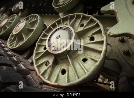 A Mechanism, green metallic gears and cogs at work on blue background ...