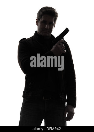 Portrait of a policeman holding a handgun Stock Photo - Alamy