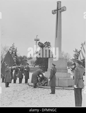 Field Marshal Harold Alexander is photographed signing a guest book at ...