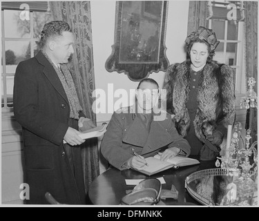 Field Marshal Harold Alexander is photographed laying a wreath at a ...