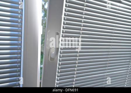 Venetian open blinds, close up image as background on the home window ...