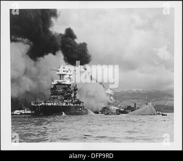 Photograph of the Capsized USS Oklahoma and the USS Maryland after the ...
