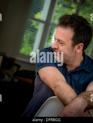 Fashion designer Andrew Fionda at his Sussex home 2013 Stock Photo - Alamy