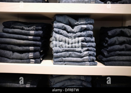 Store Display, Jeans Folded and Stacked on Tables Stock Photo ...