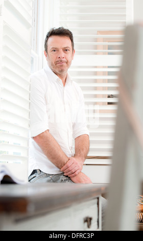 Fashion designer Andrew Fionda at his Sussex home 2013 Stock Photo - Alamy