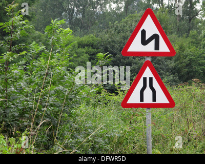 Red Triangle Caution and Warning Road Signs for a Narrowing Road and ...