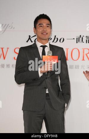 Taipei, China. 8th Oct, 2013. Actor Mark Chao presents commercial ...