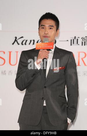 Taipei, China. 8th Oct, 2013. Actor Mark Chao presents commercial ...