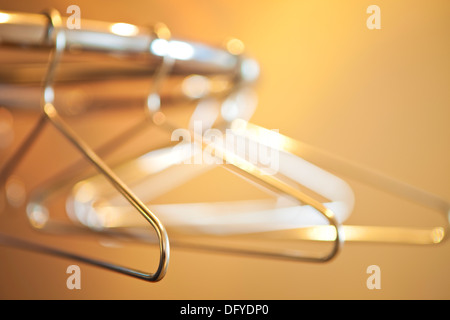 Metal blue hangers Stock Photo - Alamy