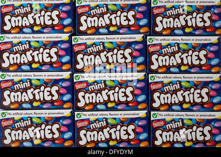 boxes of treat size Nestle mini Smarties, with two boxes showing ...