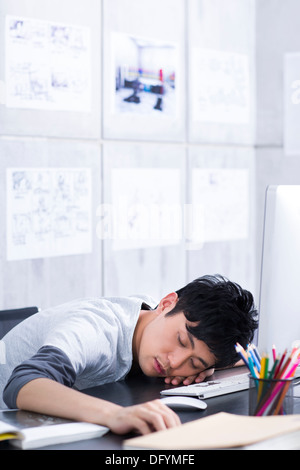 A Chinese man taking a nap ,they will do this anywhere at any time.With ...