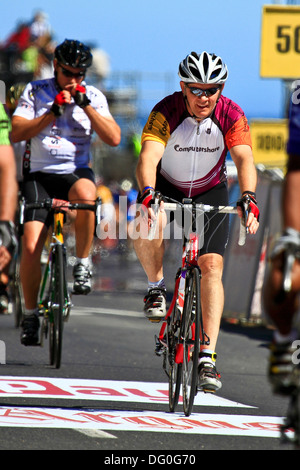 Cylists taking part in the Argus Cycle Tour 2010 bicycle race around ...
