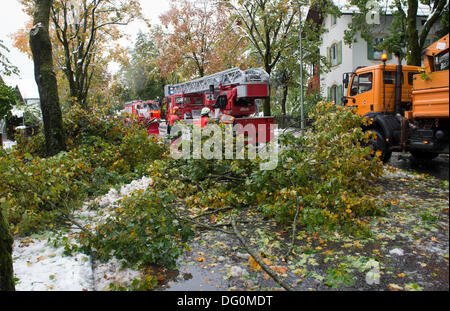 Garmisch-Partenkirchen, Germany. 11th Oct, 2013. Firemen remove a ...