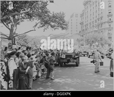 A photograph of General Dwight D. Eisenhower, with his back to the ...
