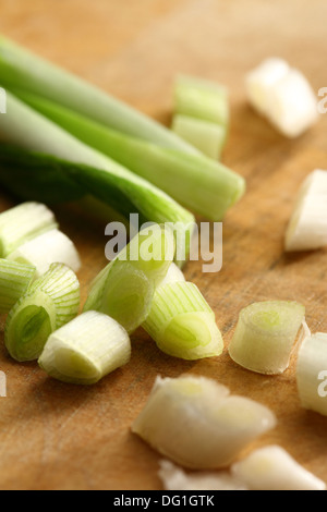 Chopped spring onions on preparation table Stock Photo - Alamy