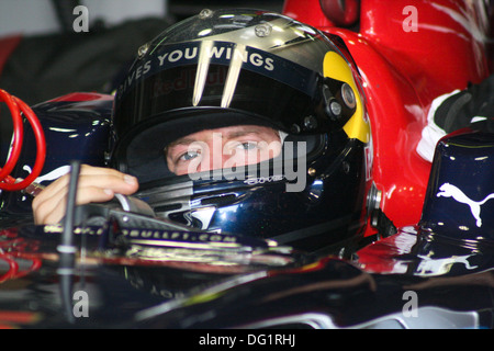 Toro Rosso driver Sebastian Vettel celebrates his victory in the ...