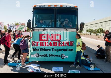 Tucson, Arizona, UK. 11th Oct, 2013. Approximately 20 protestors ...