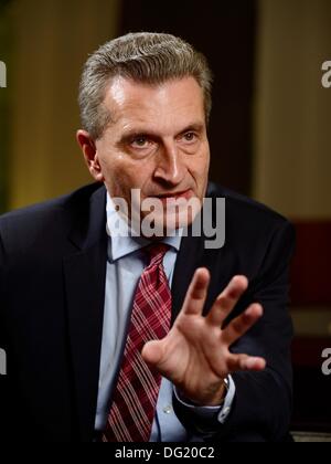 Stuttgart, Germany. 11th Oct, 2013. EU Commissioner for Energy Guenther ...