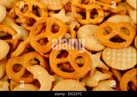 Mixed salty snack crackers and pretzels Stock Photo - Alamy