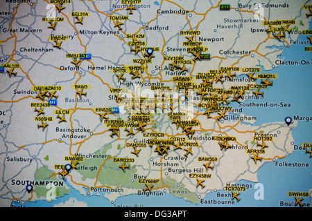 Commercial aircraft stack in holding patterns over London, UK, as seen ...