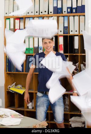 A pile of documents with the man in the document Stock Photo - Alamy