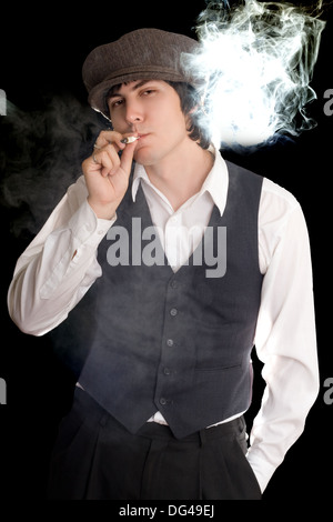 Handsome young man puffing out cheeks, having fun making funny face ...