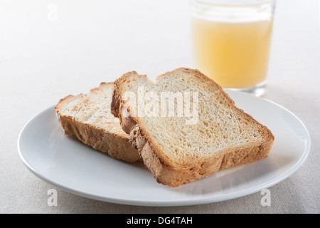 two toast plate with fruit juice Stock Photo - Alamy