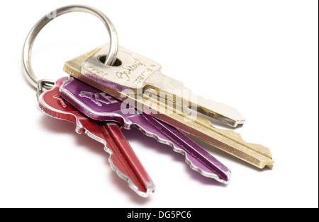 silver coloured keys on a white background Stock Photo - Alamy