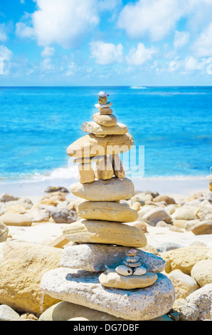 Stack of sea rocks balancing by Pacific ocean Stock Photo - Alamy