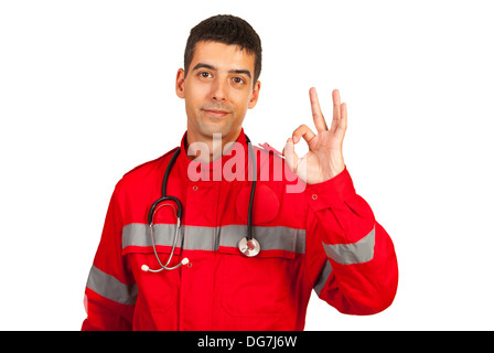 Successful paramedic man showing okay sign hand gesture isolated on ...