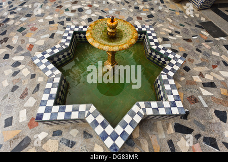 Morocco. Fez. Islamic tiled fountain. Falling water. Semi circular ...