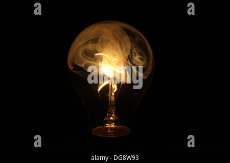 Burnt out light bulb on a white background with shadow Stock Photo - Alamy