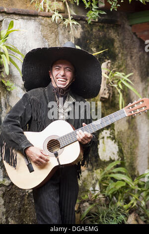 Mariachi with guitar Stock Photo - Alamy